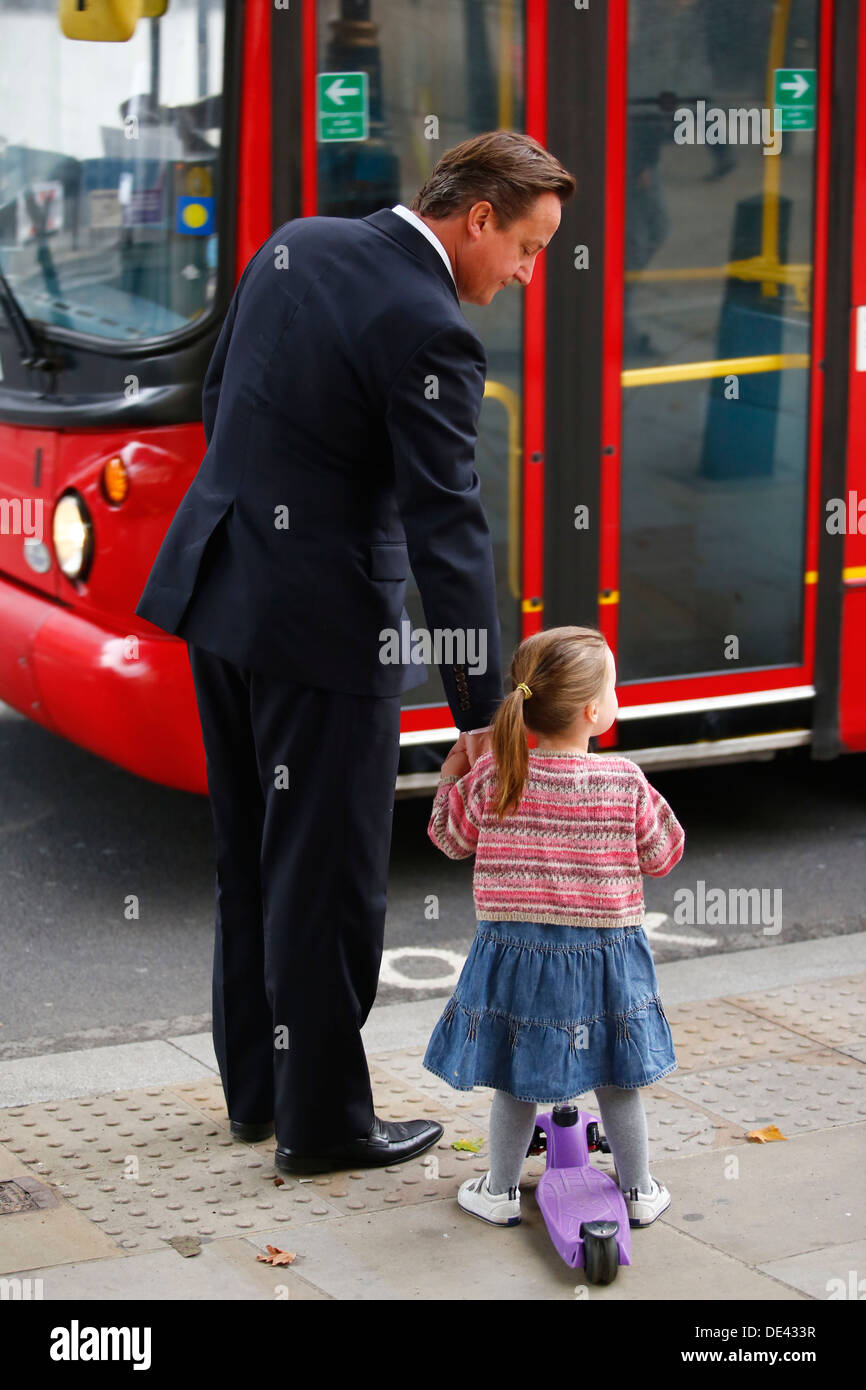 British Prime Minister David Cameron walking his daughter Florence to ...
