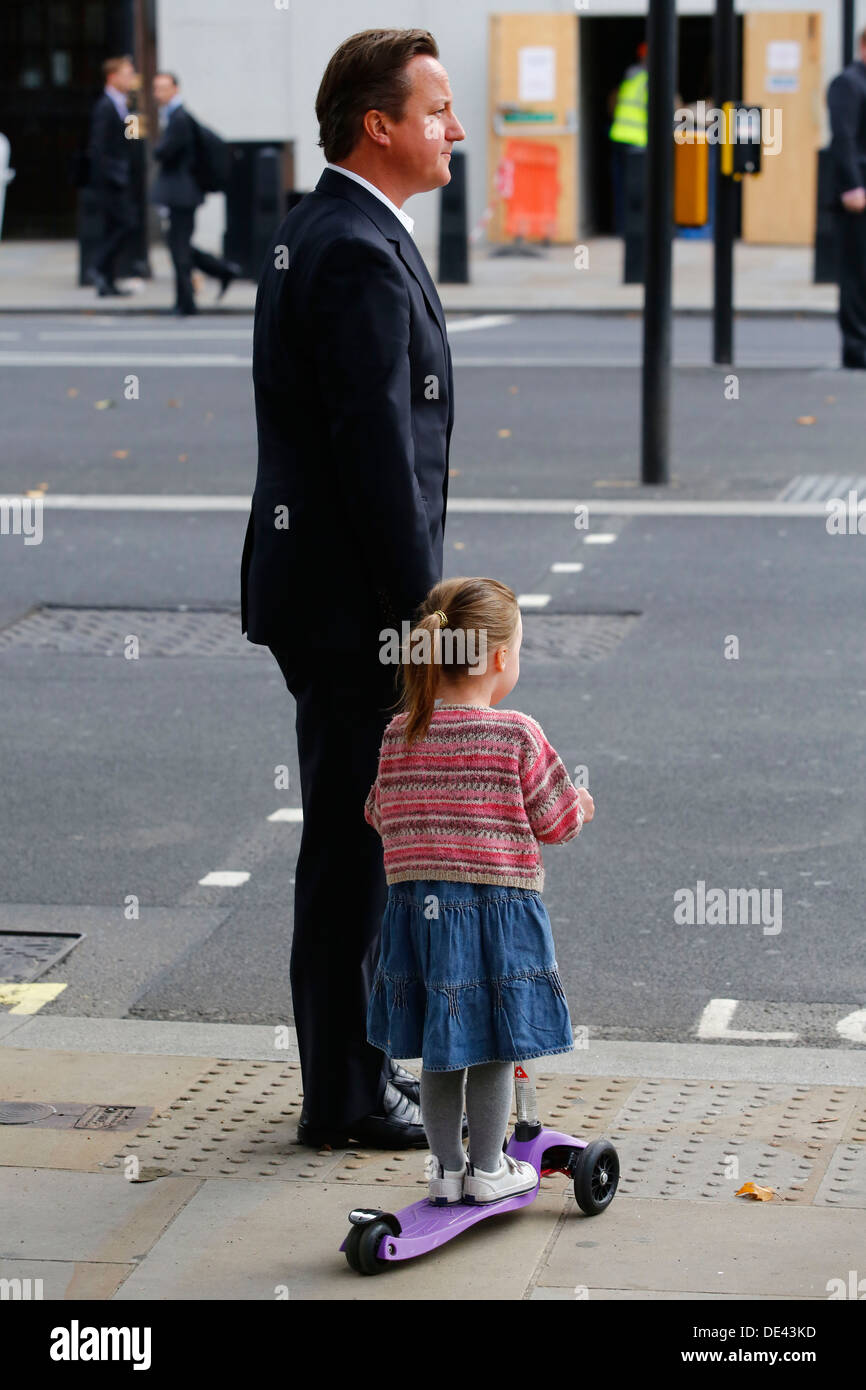 British Prime Minister David Cameron walking his daughter Florence to ...
