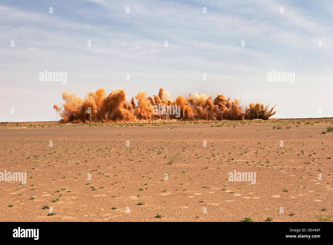 Blasting ore bearing rock in an opencast surface gold mine pit, Western ...