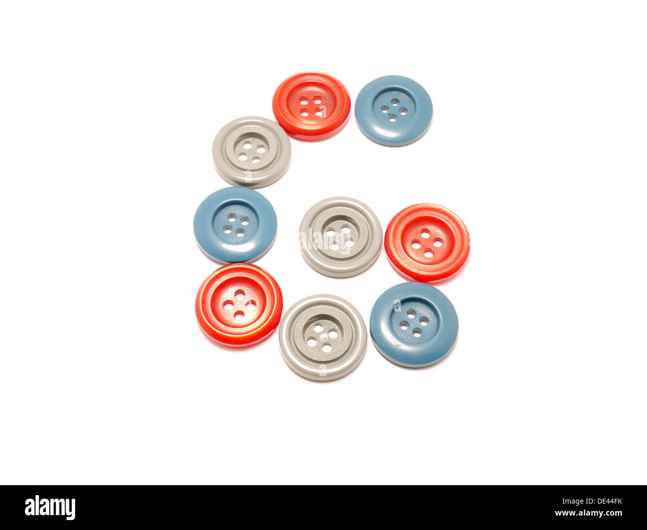Letter "G" from buttons on a white background Stock Photo - Alamy