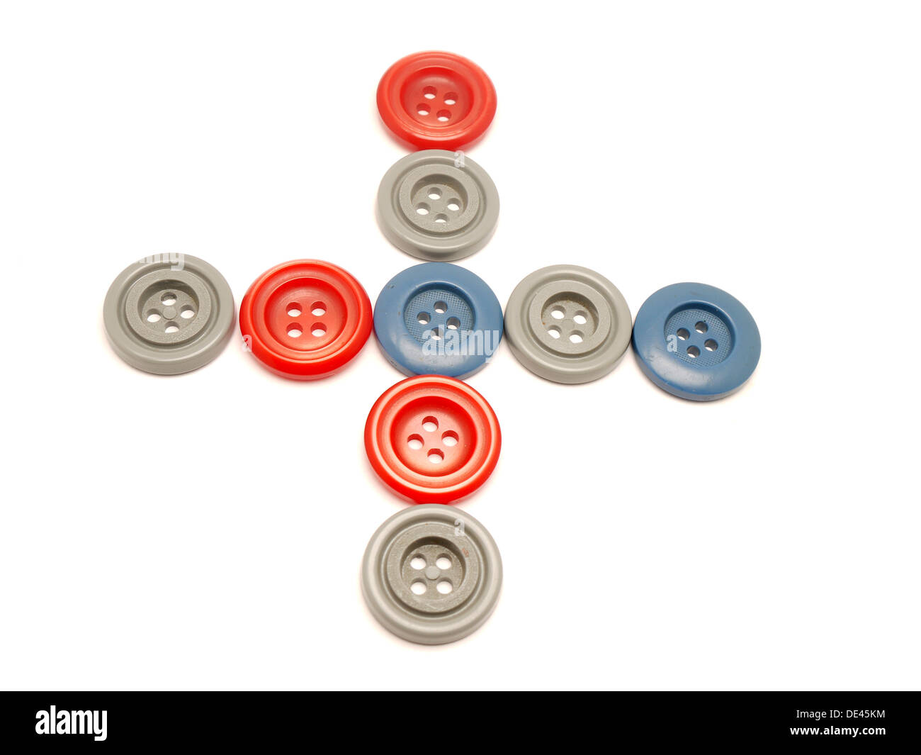 Figure "+" from buttons on a white background Stock Photo - Alamy