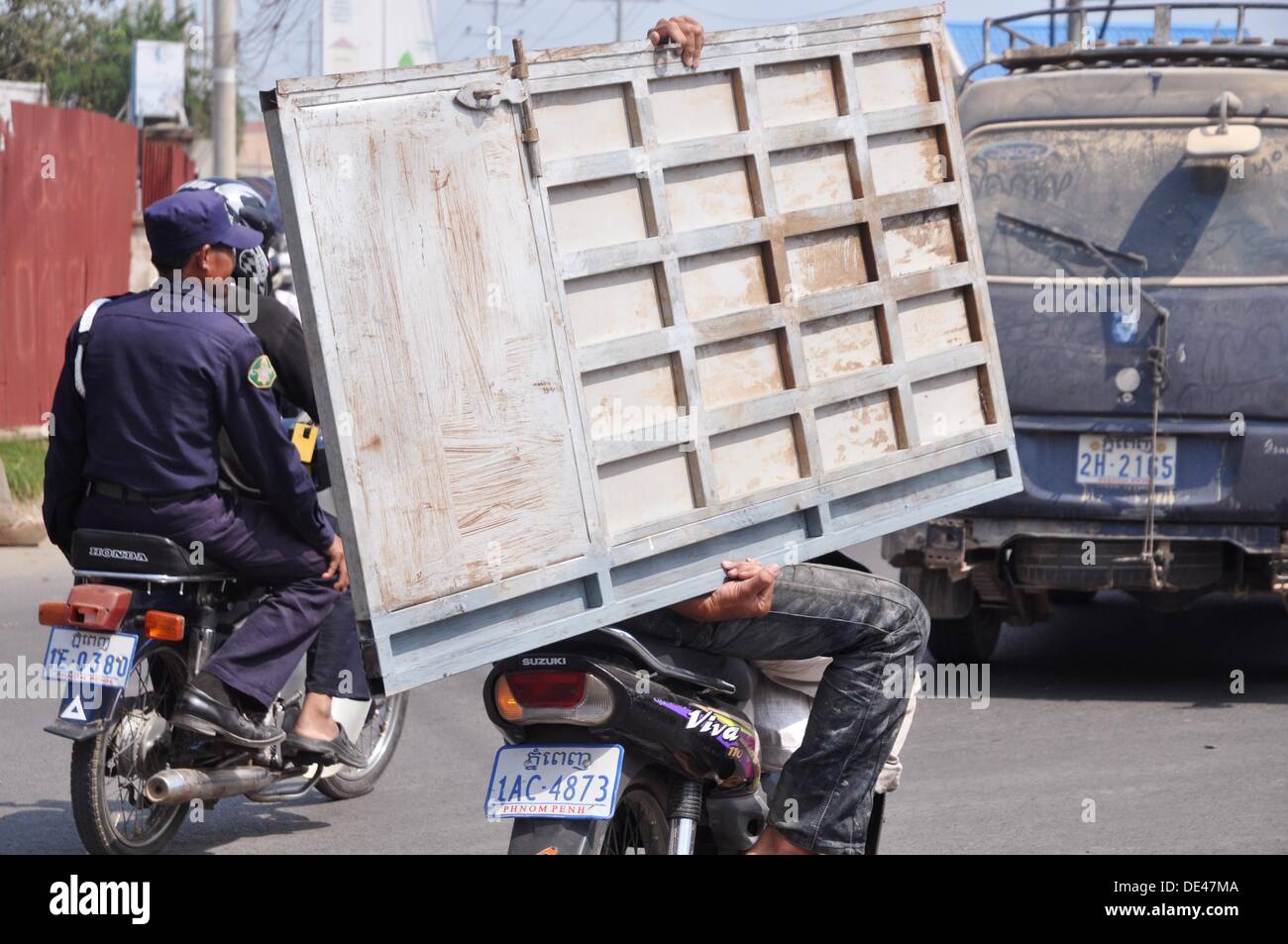 Motor scooter carrying hi-res stock photography and images - Alamy