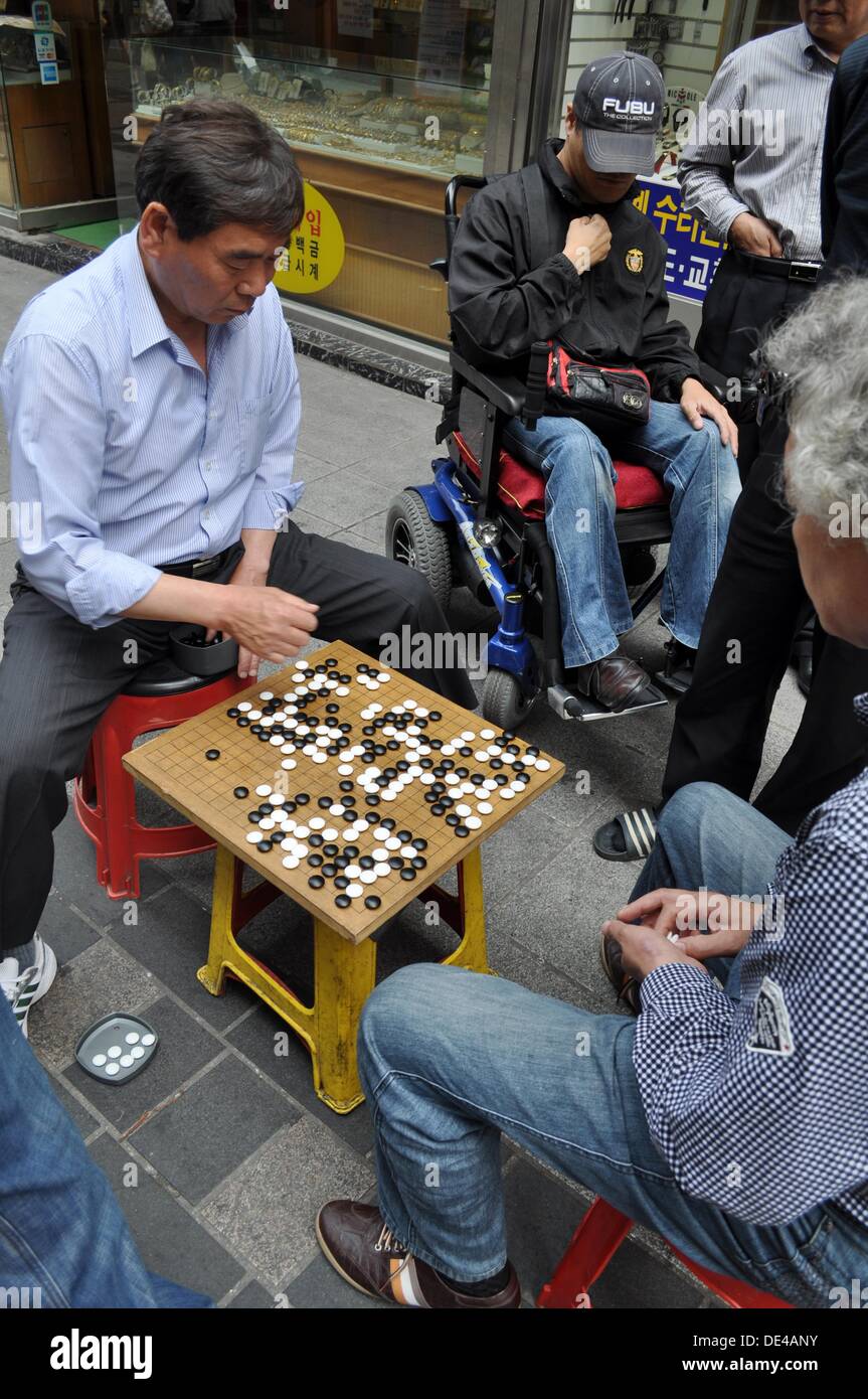Men playing baduk at hi-res stock photography and images - Alamy