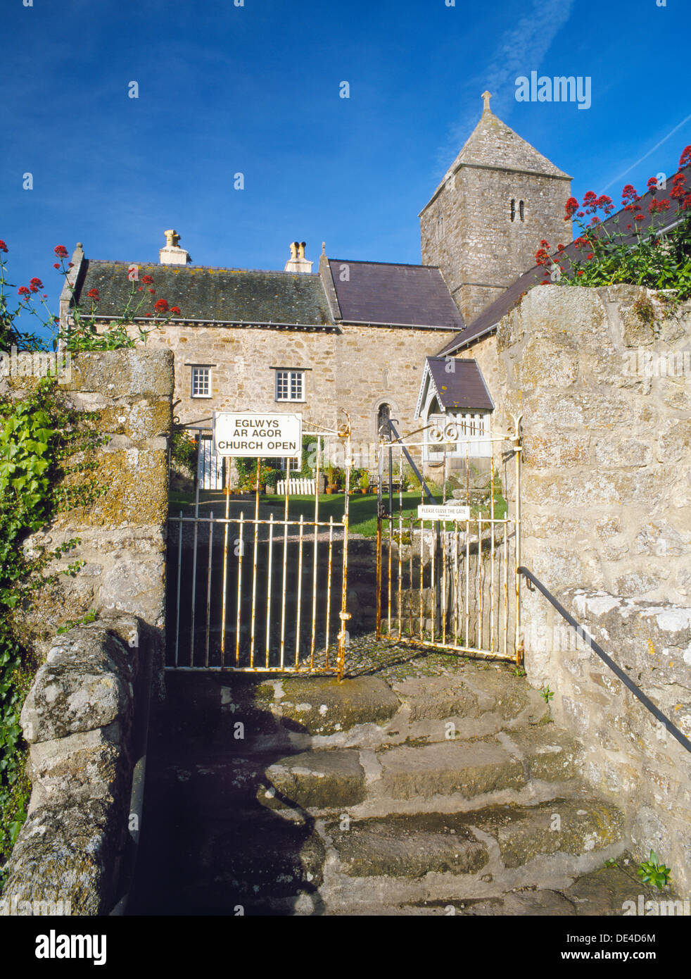 The approach to St Seiriol's church, Penmon, Anglesey, and the cloister ...