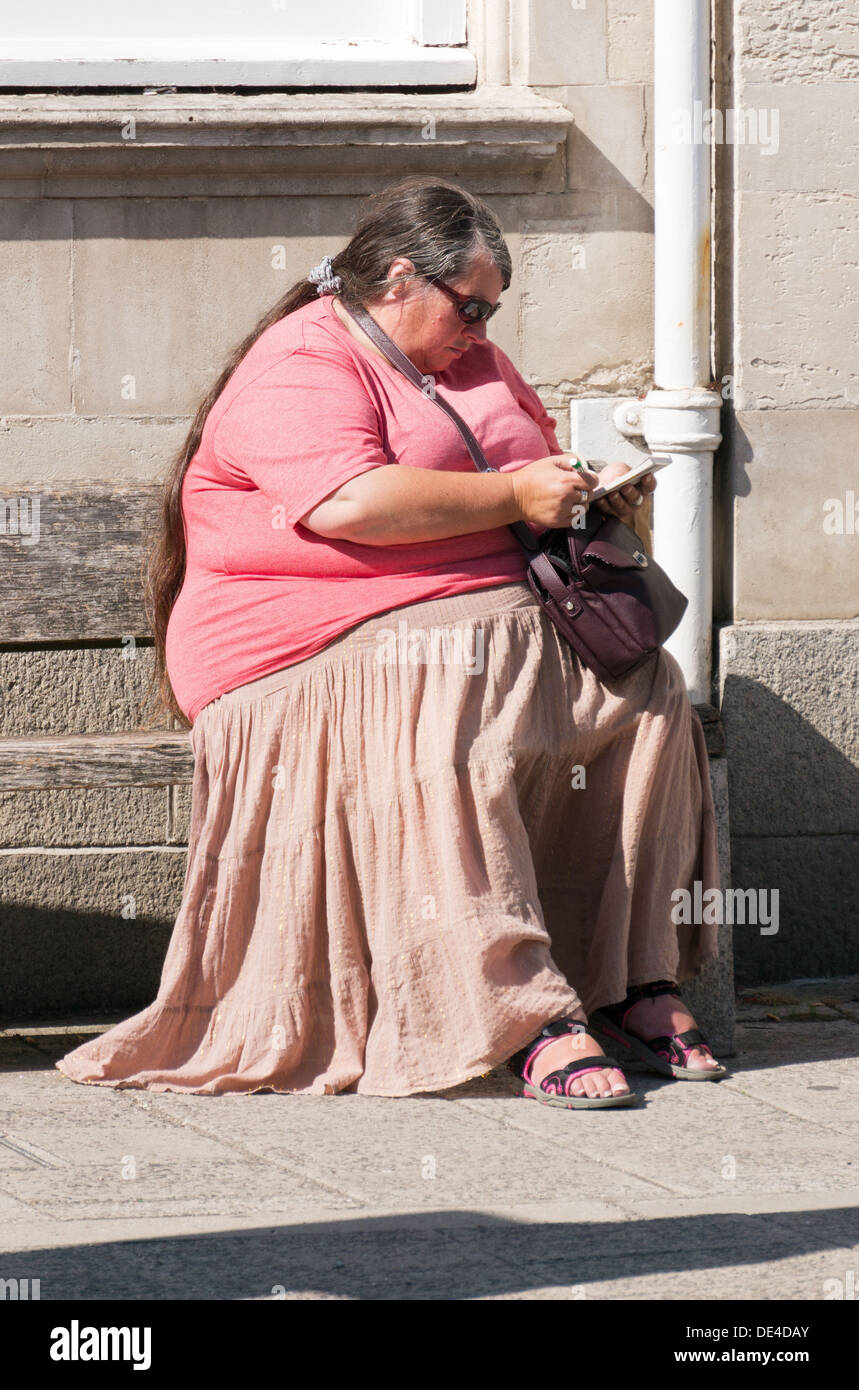 Obese overweight sitting woman hi-res stock photography and images - Alamy