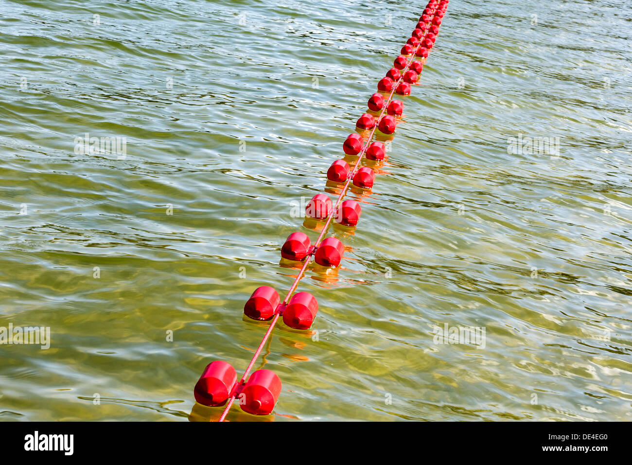 On the waters of the lake floating plastic buoys Stock Photo - Alamy