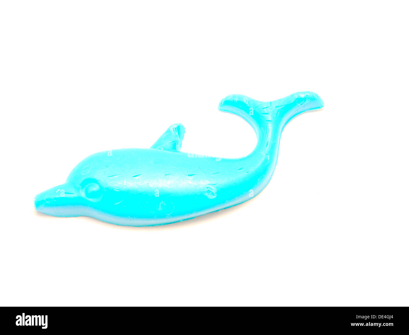 bath soap in the shape of a blue dolphin, isolated on white background ...