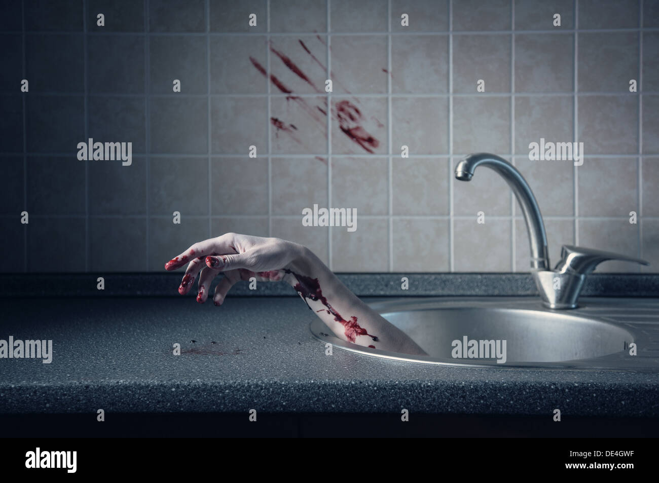 Bloody hand in kitchen sink, Halloween concept Stock Photo - Alamy