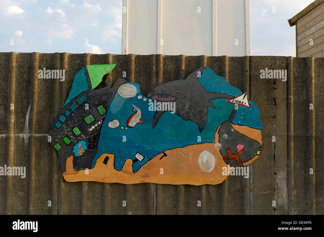 Child's mural on sea wall, ecological message, Normandy, France Stock ...