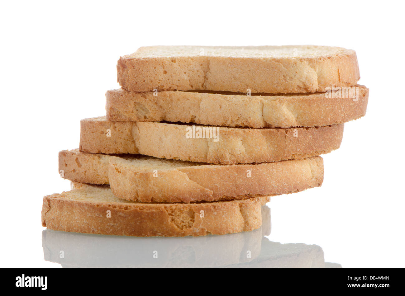 Several pieces of golden brown toast on white background Stock Photo ...