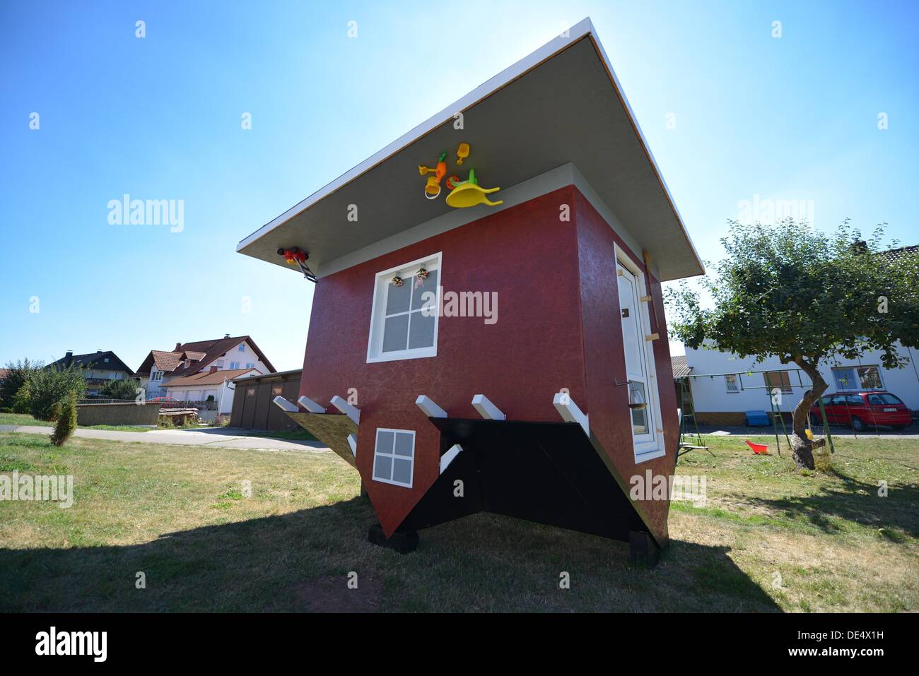 A garden cabin stands upside down in a garden in Wellen, Germany, 5 ...