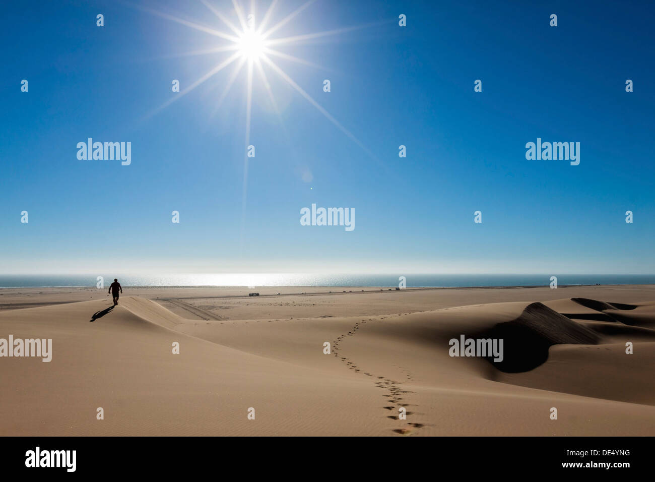 Man walking in the dune belt of Long Beach, Swakopmund, Namibia Stock ...