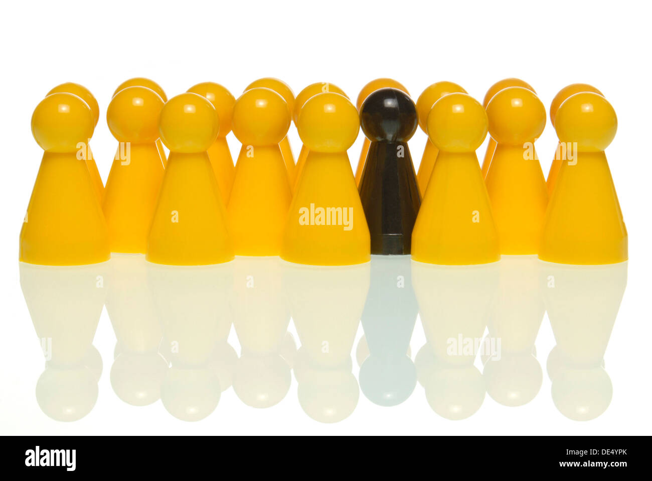 Black figure surrounded yellow figures hi-res stock photography and ...