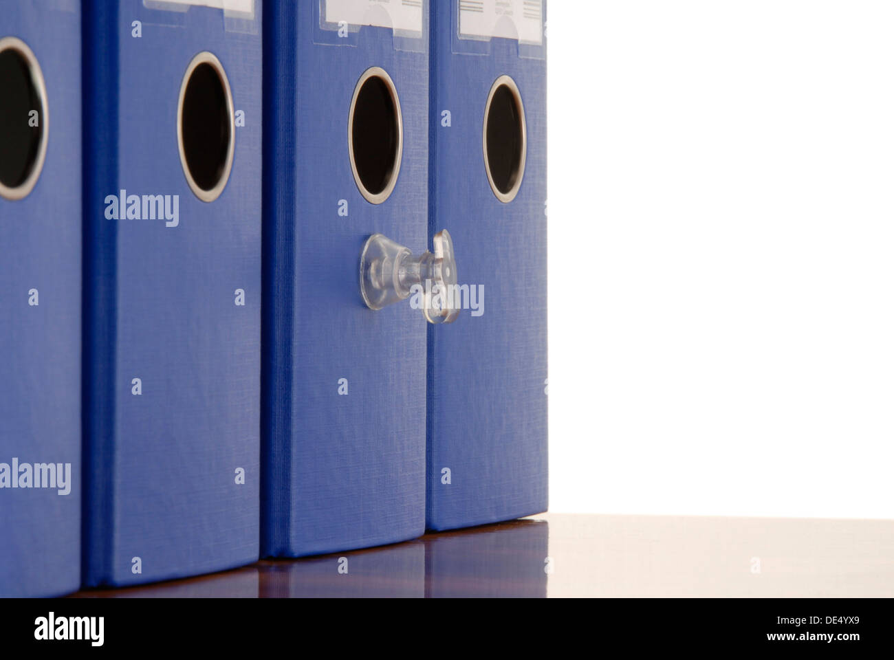 Blue file folders with valve standing on a desk, symbolic image for ...