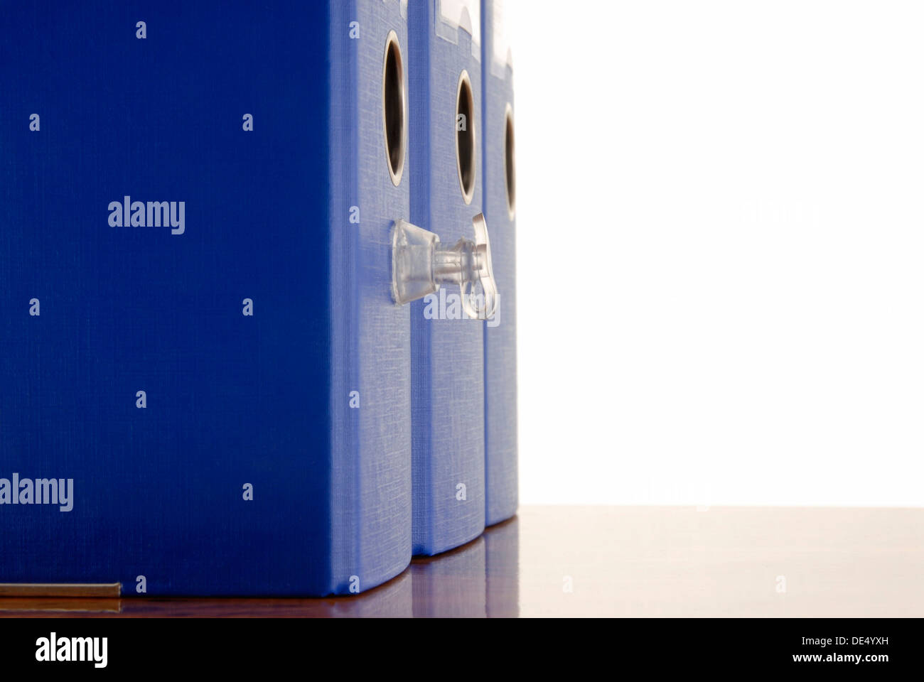 Blue file folders with valve standing on a desk, symbolic image for ...