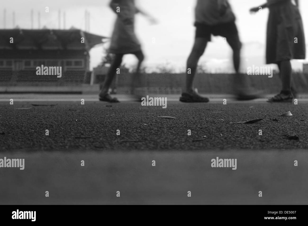 People running across a running track in China Stock Photo - Alamy