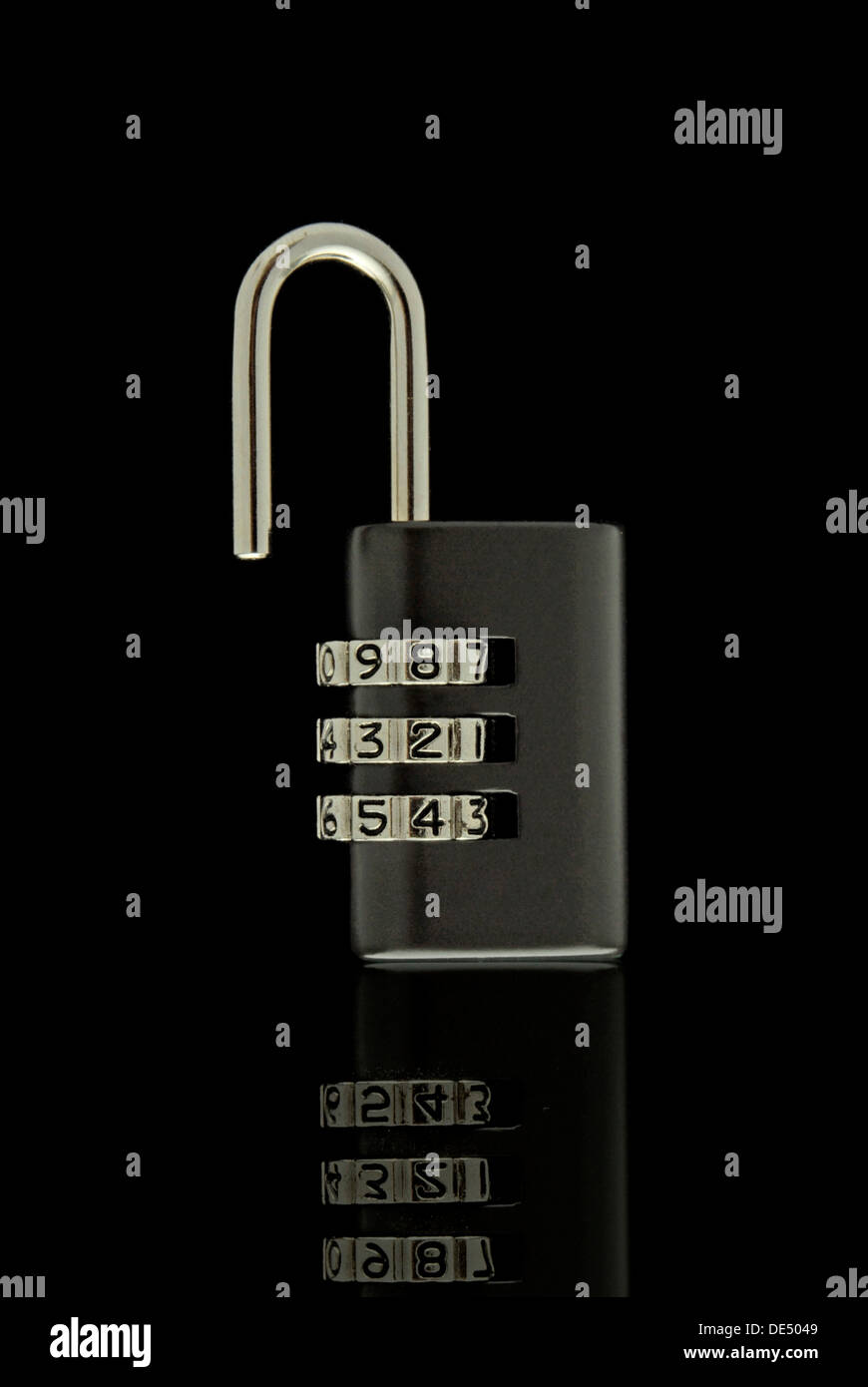 Black unlocked combination lock on black Stock Photo - Alamy