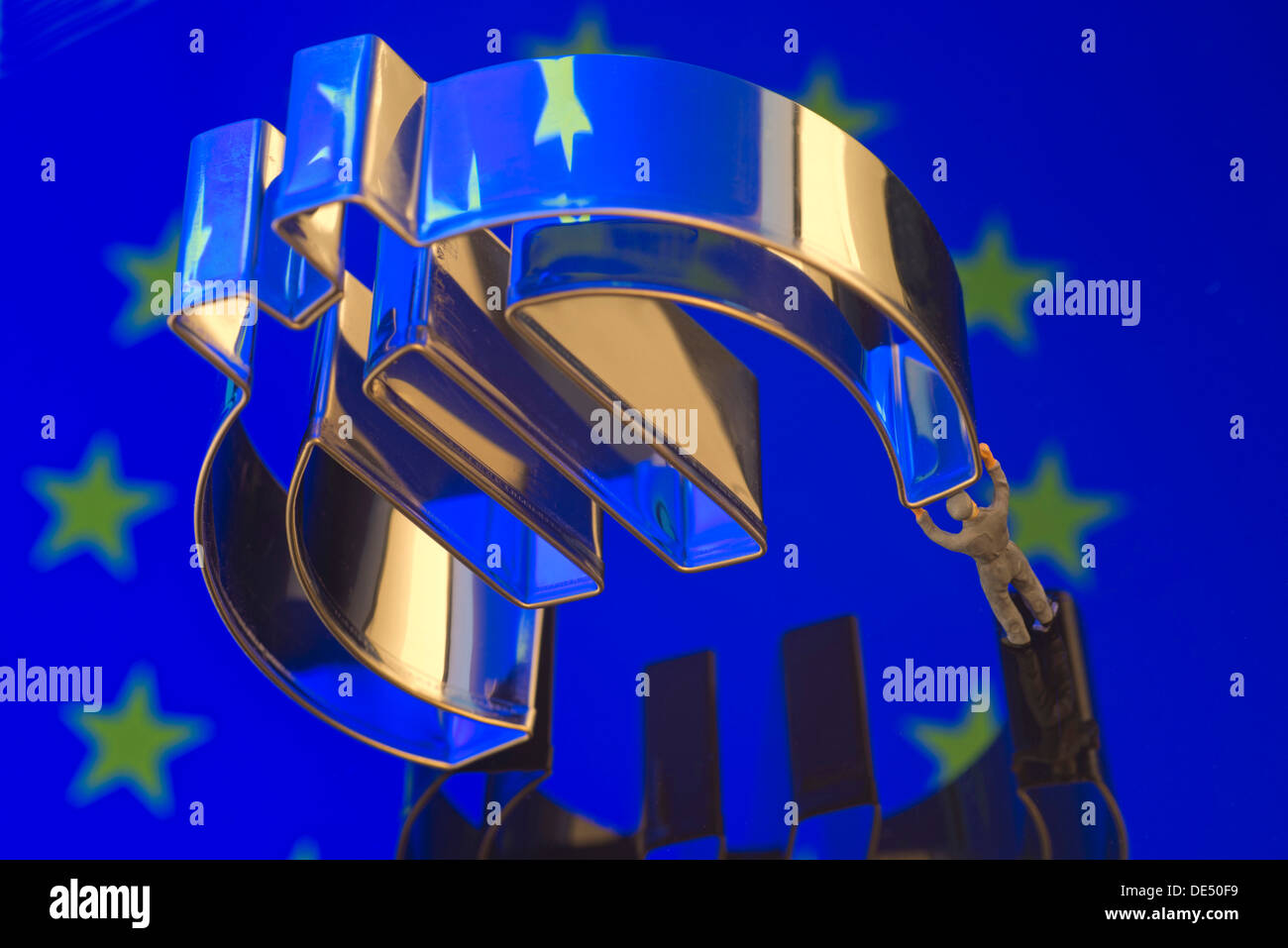 Man carrying currency symbol hi-res stock photography and images - Alamy