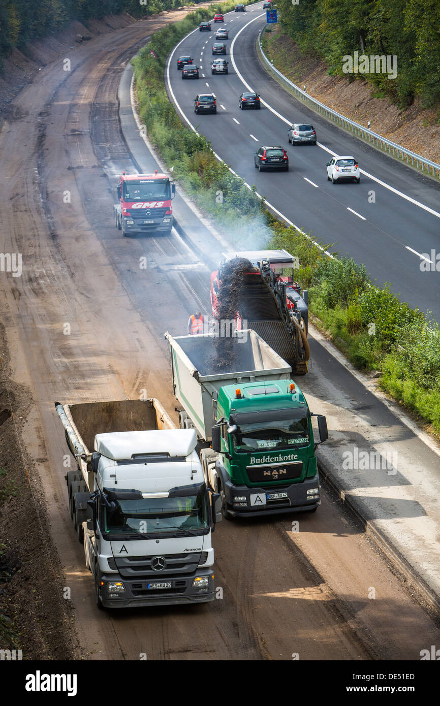 Roadworks, on Autobahn A52, Essen, Germany. Removal of the asphalt ...