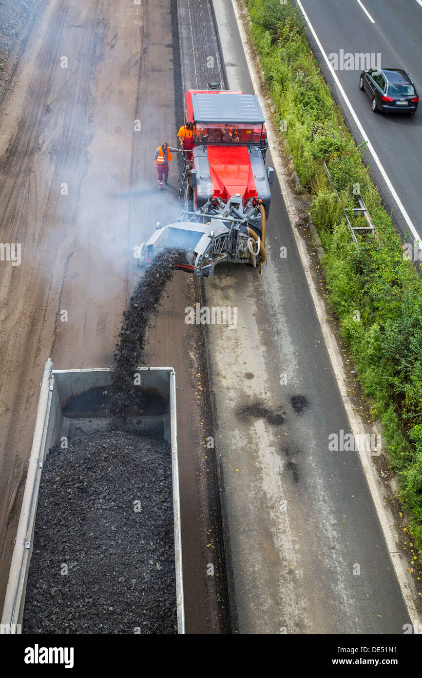 Roadworks, on Autobahn A52, Essen, Germany. Removal of the asphalt ...