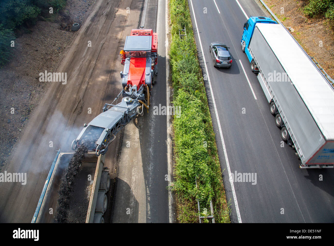 Roadworks, on Autobahn A52, Essen, Germany. Removal of the asphalt ...