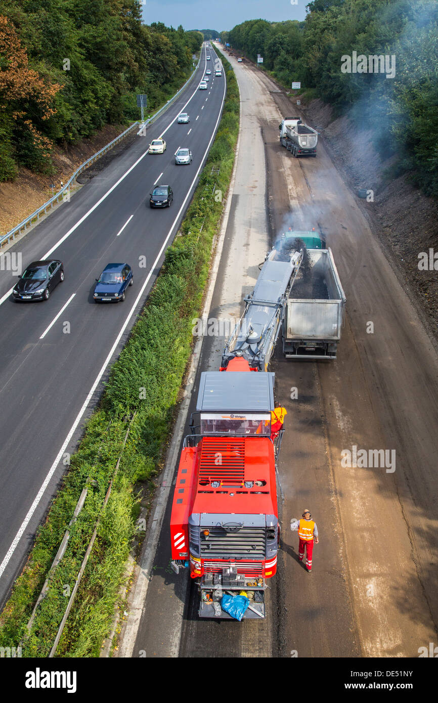 Roadworks, on Autobahn A52, Essen, Germany. Removal of the asphalt ...