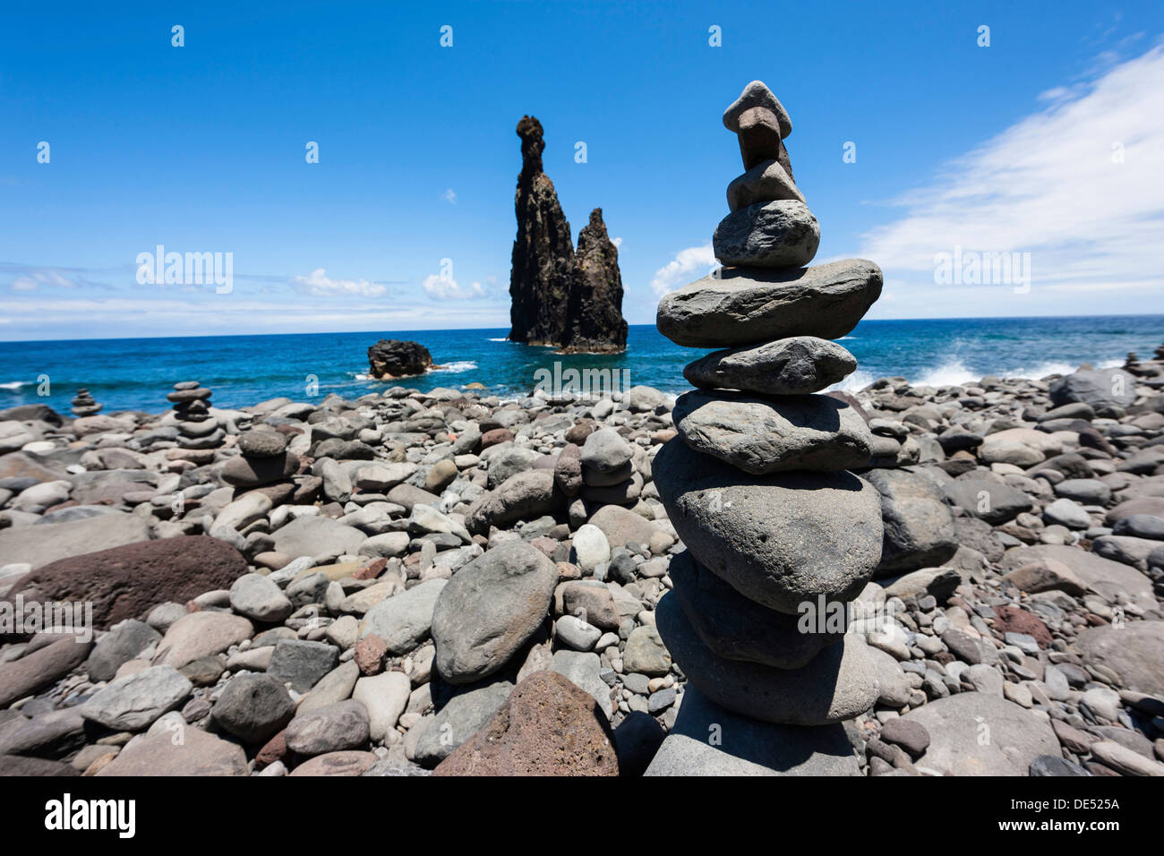 Cairns built as good luck charms at the Ilheus da Rib rock formation ...