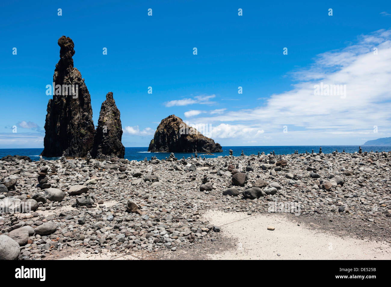 Cairns built as good luck charms at the Ilheus da Rib rock formation ...