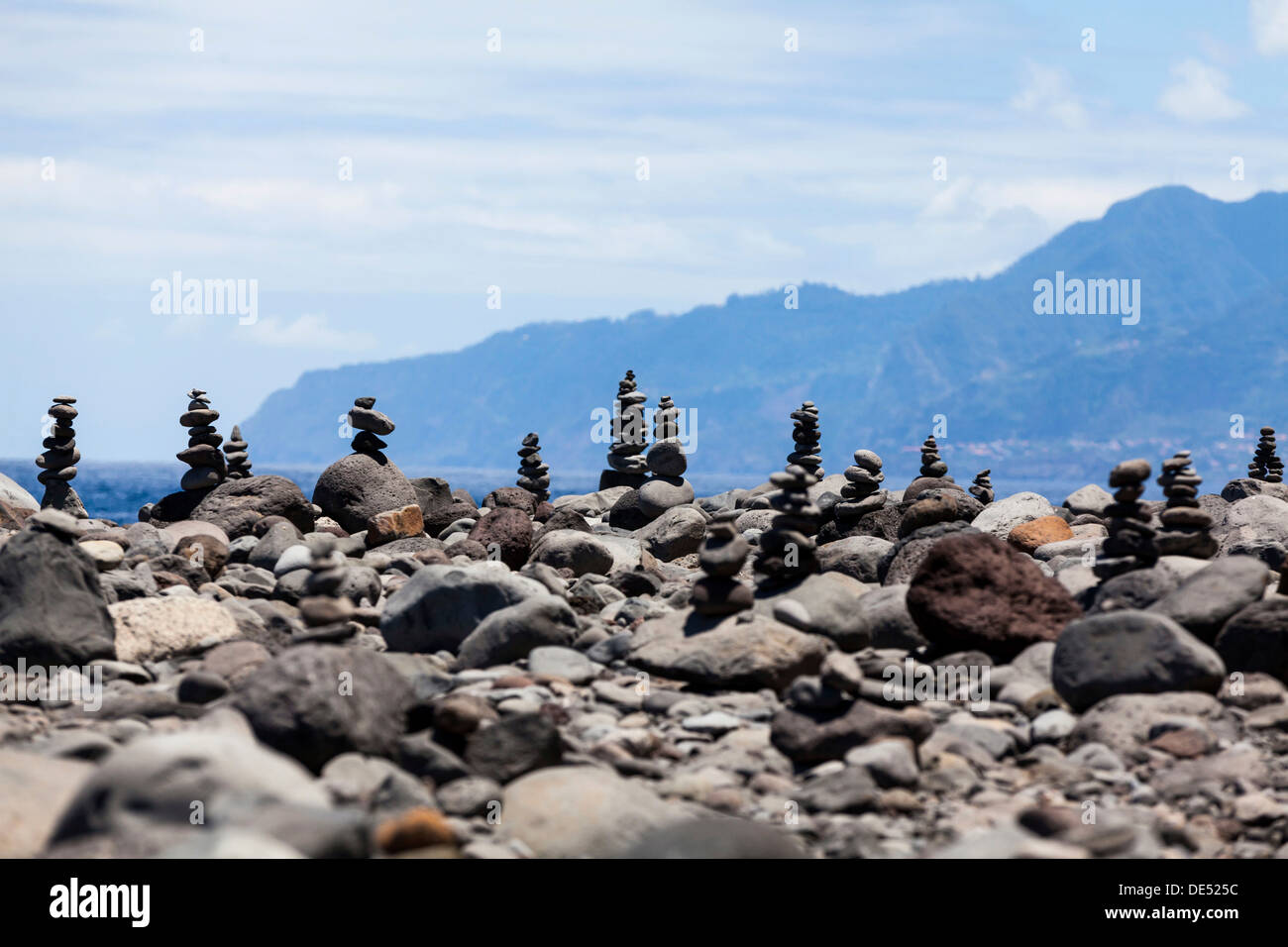 Cairns built as good luck charms at the Ilheus da Rib rock formation ...