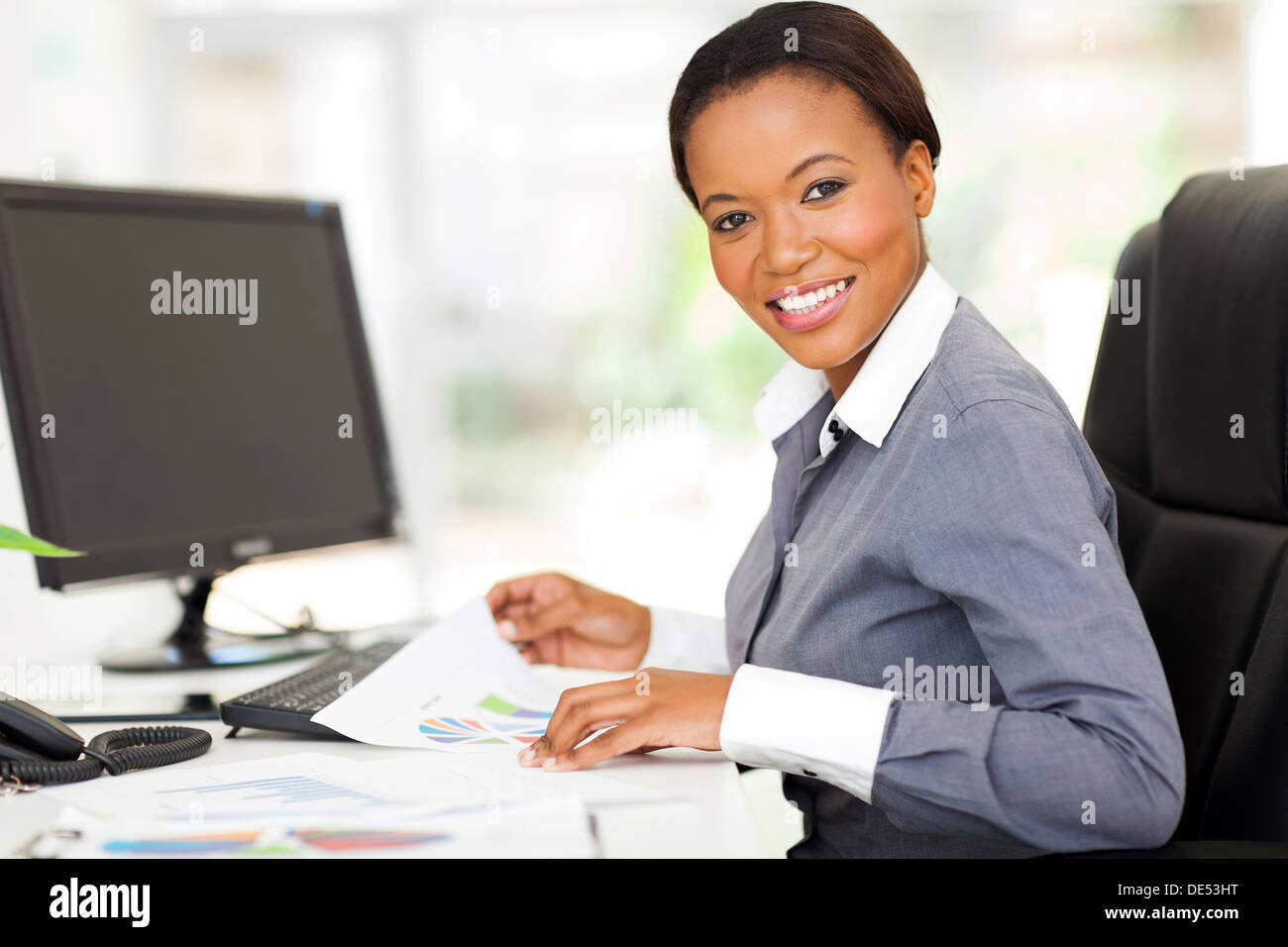 beautiful young African office worker in modern office Stock Photo - Alamy