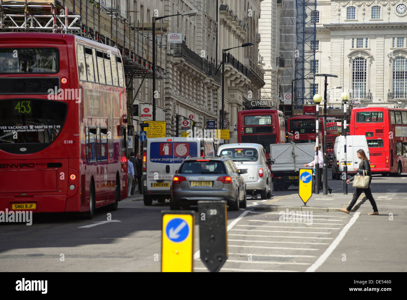 Busy London street with typical red double decker buses Stock Photo - Alamy