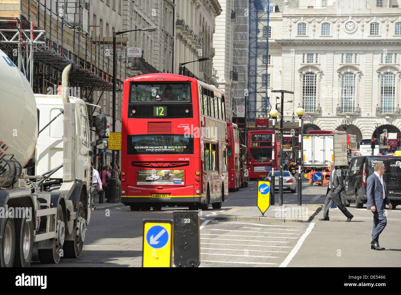 Busy London street with typical red double decker buses Stock Photo - Alamy