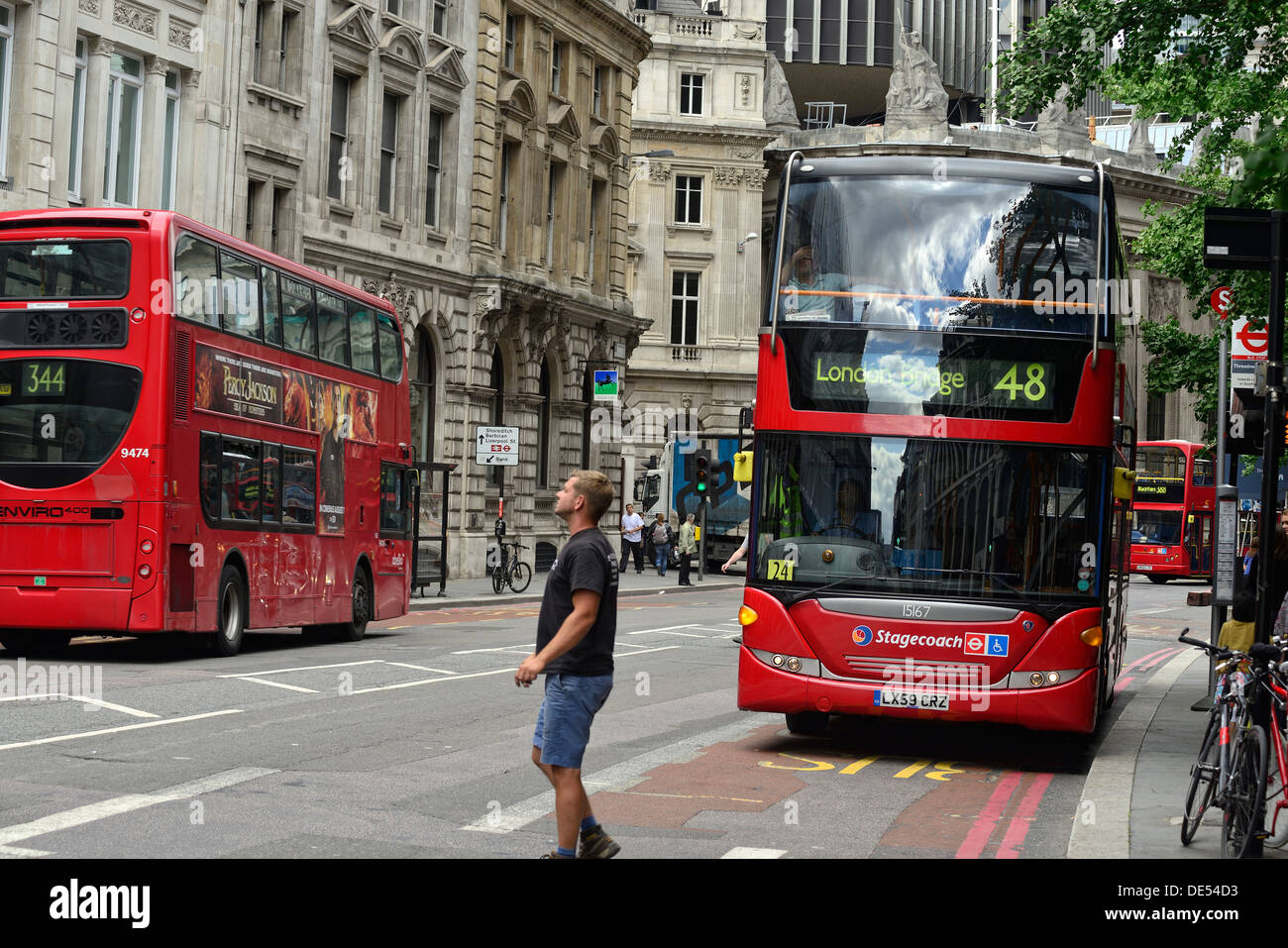 Man walking in front bus hi-res stock photography and images - Alamy