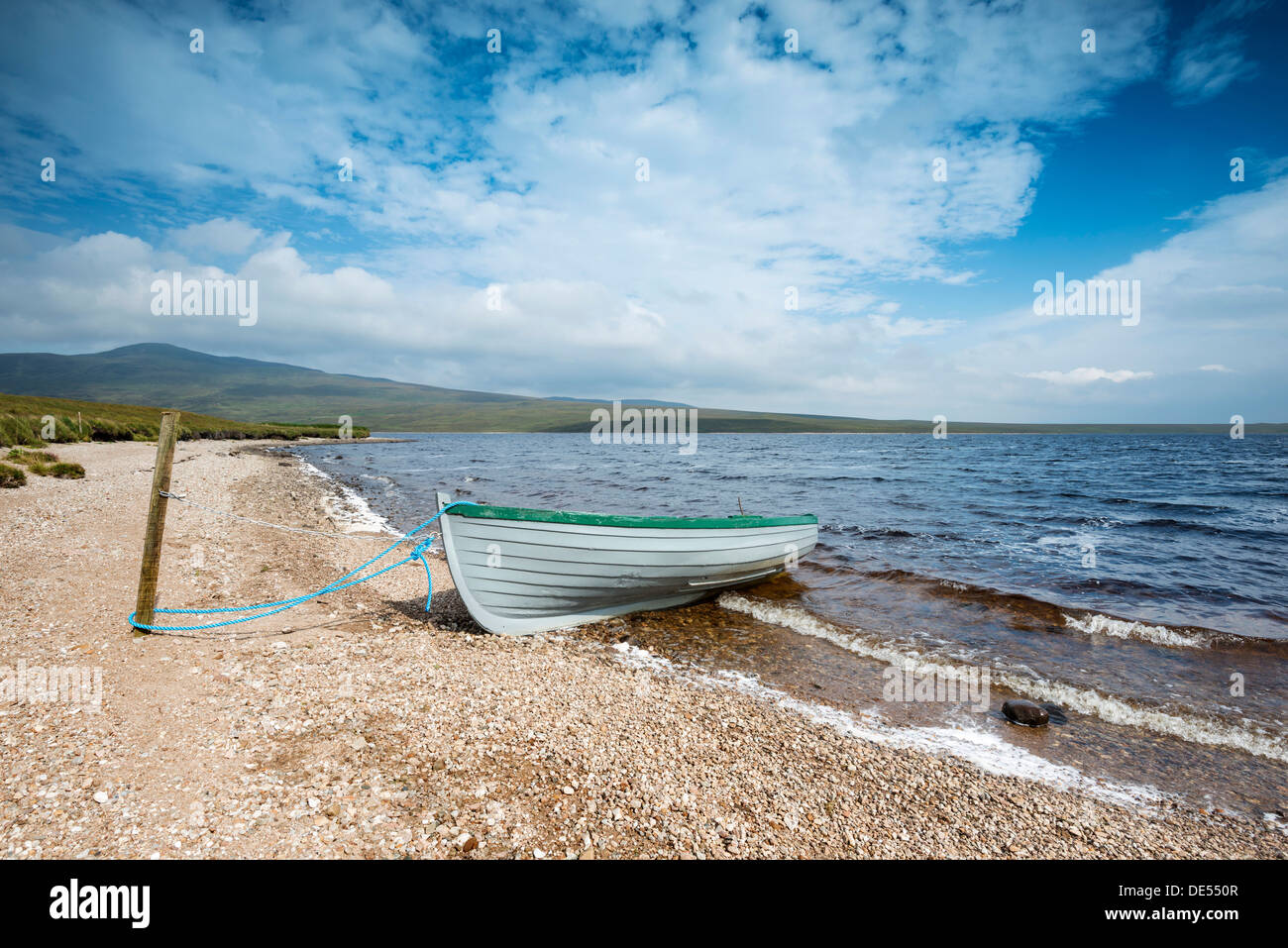 Fishing boat on the shore of Loch Loyal, Sutherland, Scotland, Great ...