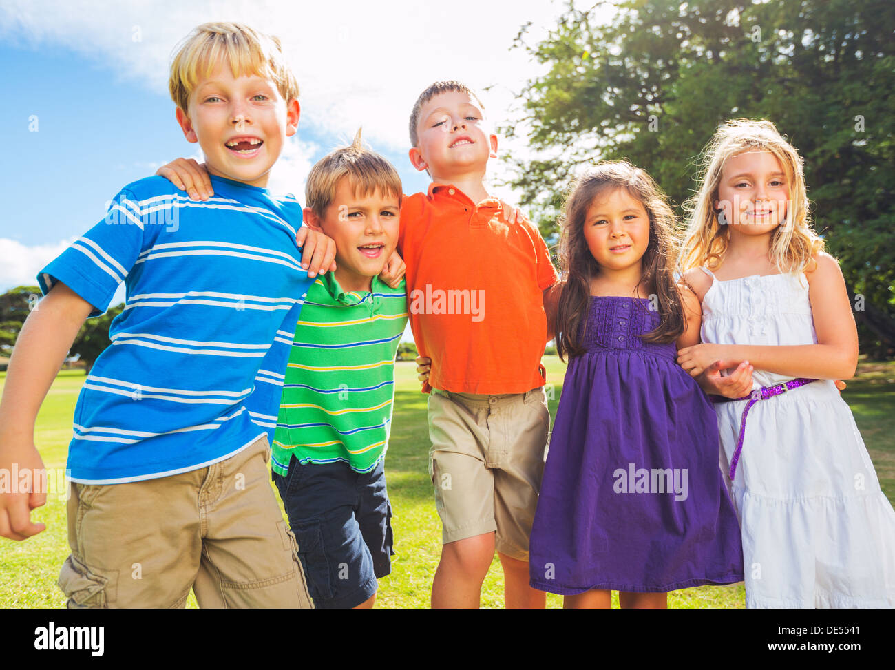 Group of Happy Kids Playing Together Outside, Friendship Concept Stock ...