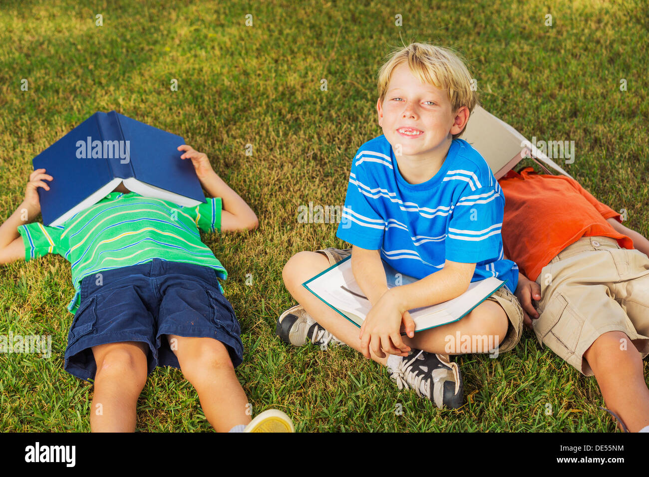 Group of Happy Kids Reading Books Outside, Friendship and Learning ...