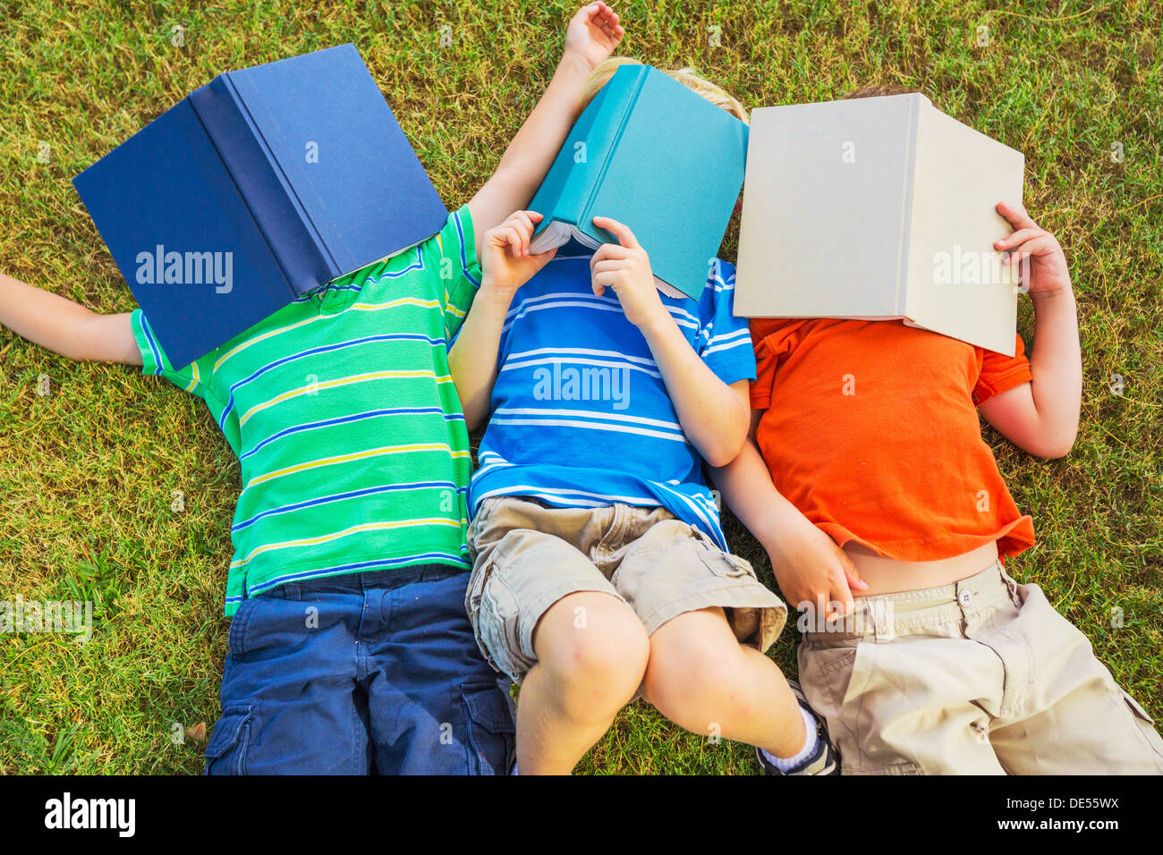 Group of Happy Kids Reading Books Outside, Friendship and Learning ...