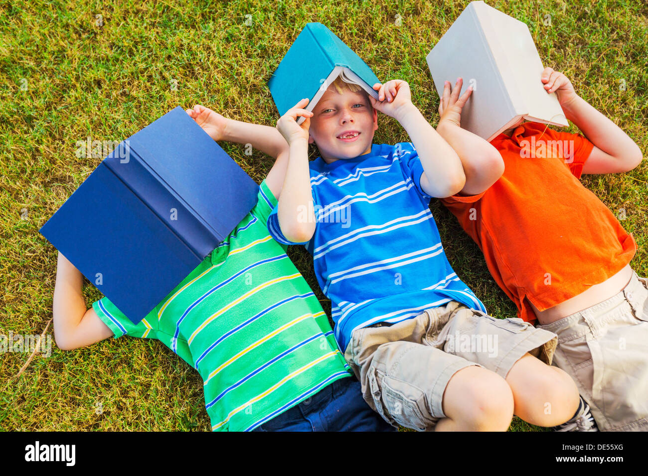 Group of Happy Kids Reading Books Outside, Friendship and Learning ...