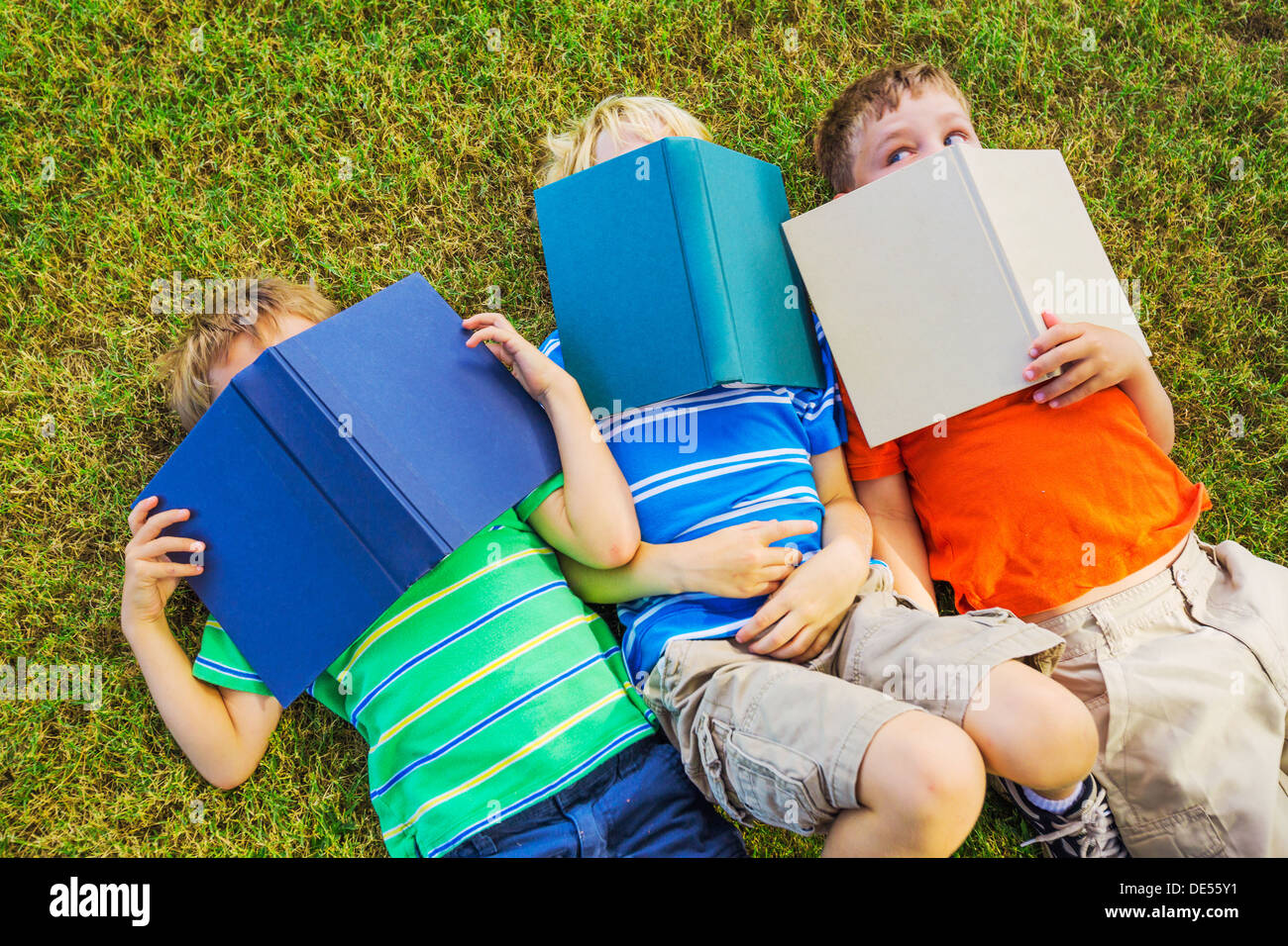 Kids Reading Books Outside