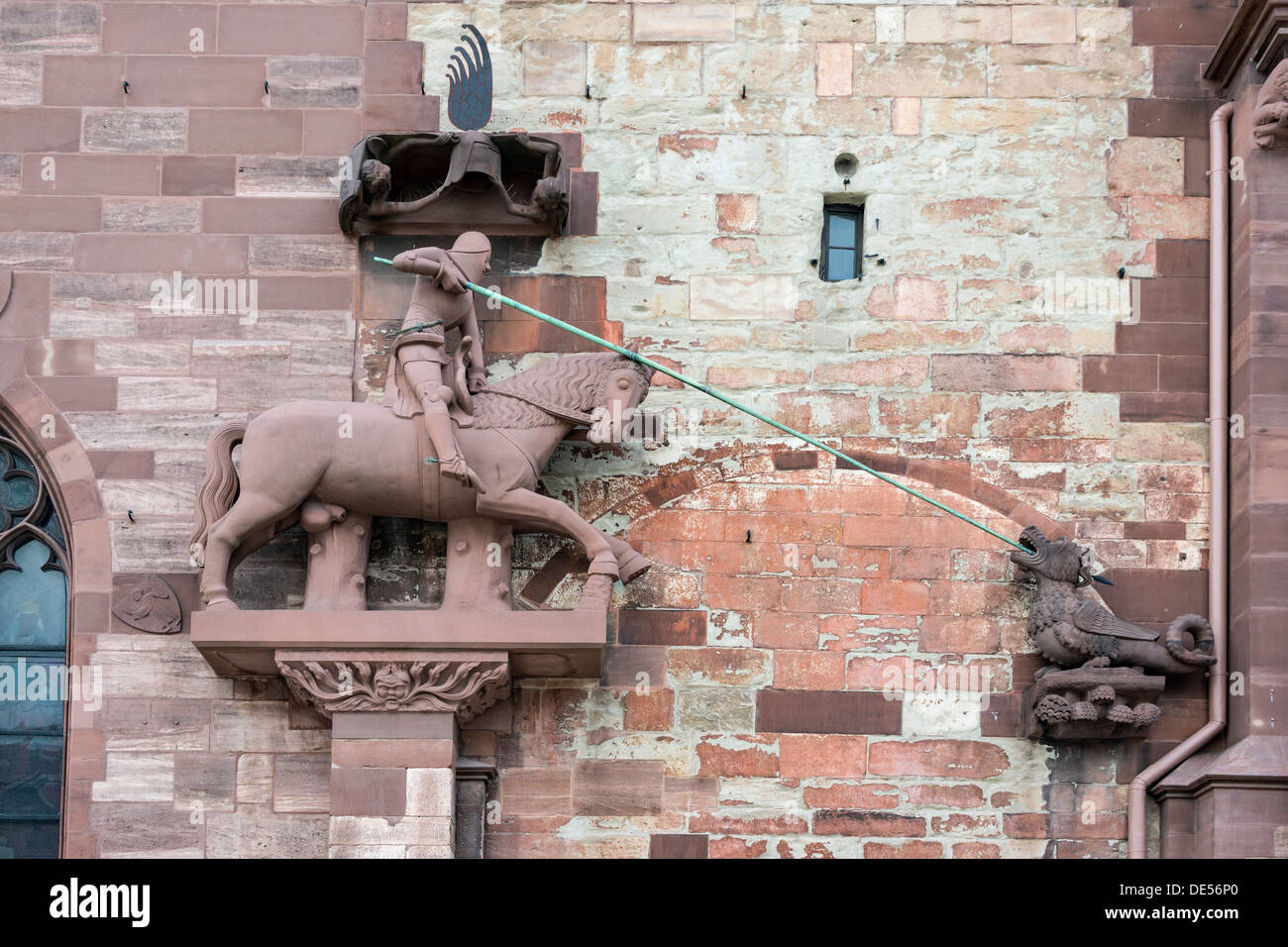 Statue of St George spearing a small dragon, Basel Munster, Basel ...