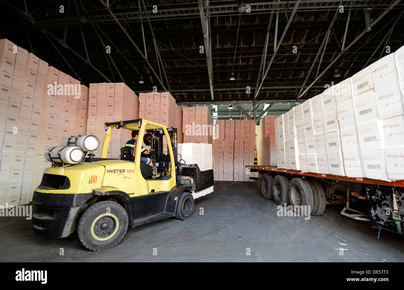 Stacks of paper are loaded onto a ship for export to China at the Port ...