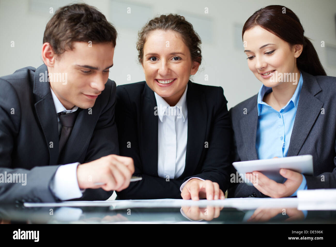 Portrait of smart business partners working together in office Stock ...
