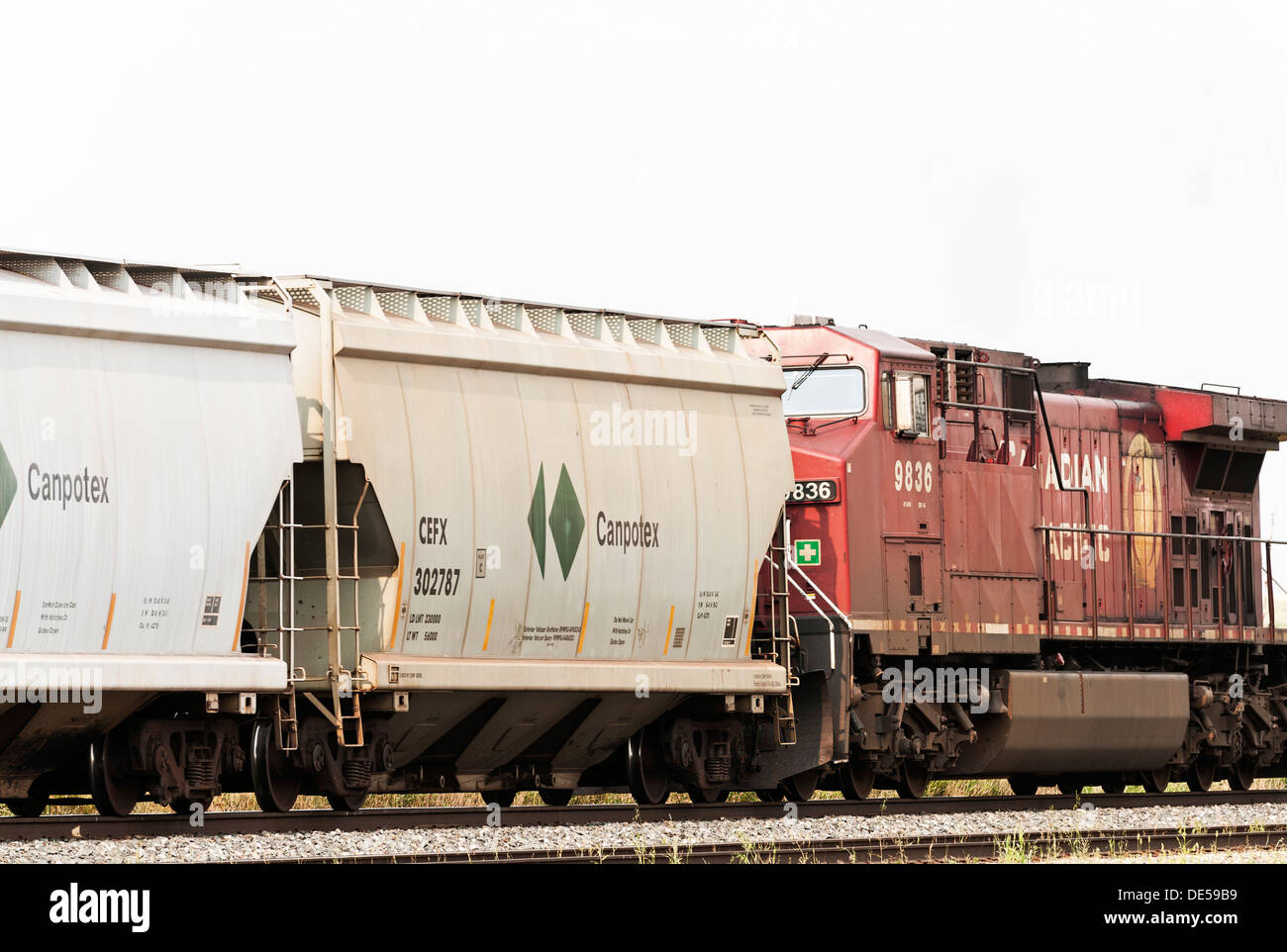 A Canadian Pacific Railway (CP Rail) freight train hauling Canpotex rail cars, Maple Creek ...
