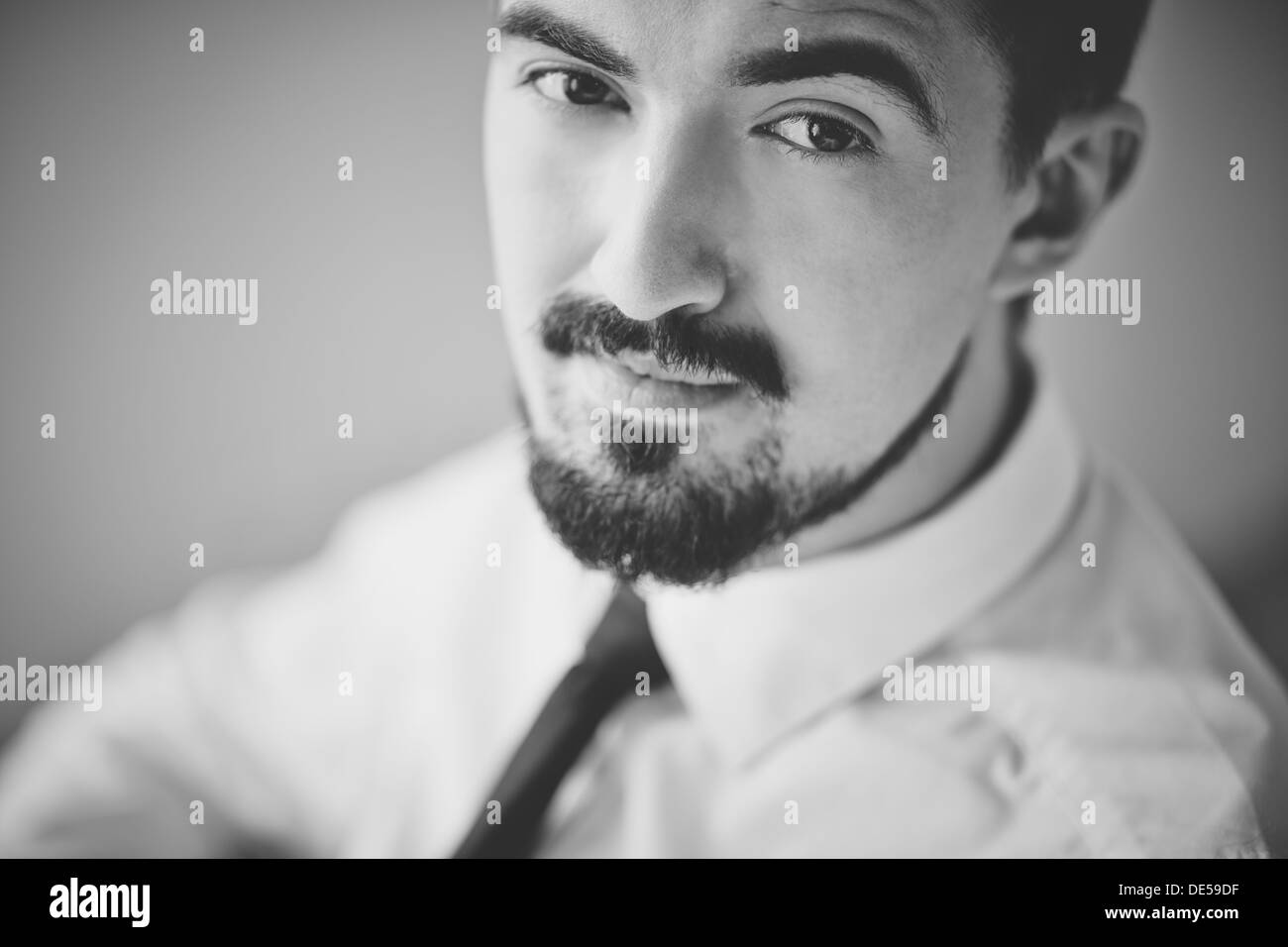 Black-and-white image of posh guy looking at camera Stock Photo - Alamy