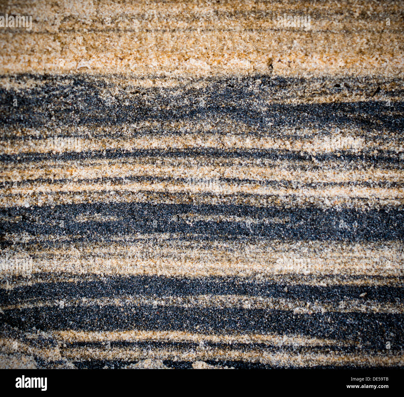 sand ripple texture with black and yellow strips, background Stock ...