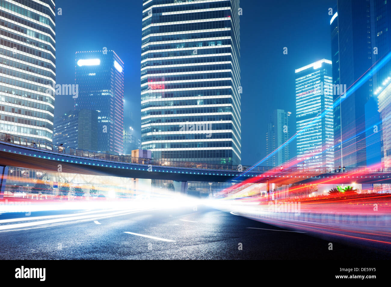 the light trails on the modern building background in shanghai china ...