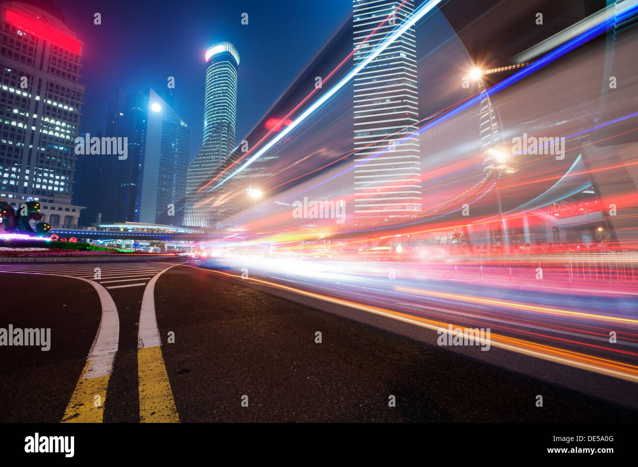 the light trails on the modern building background in shanghai china ...