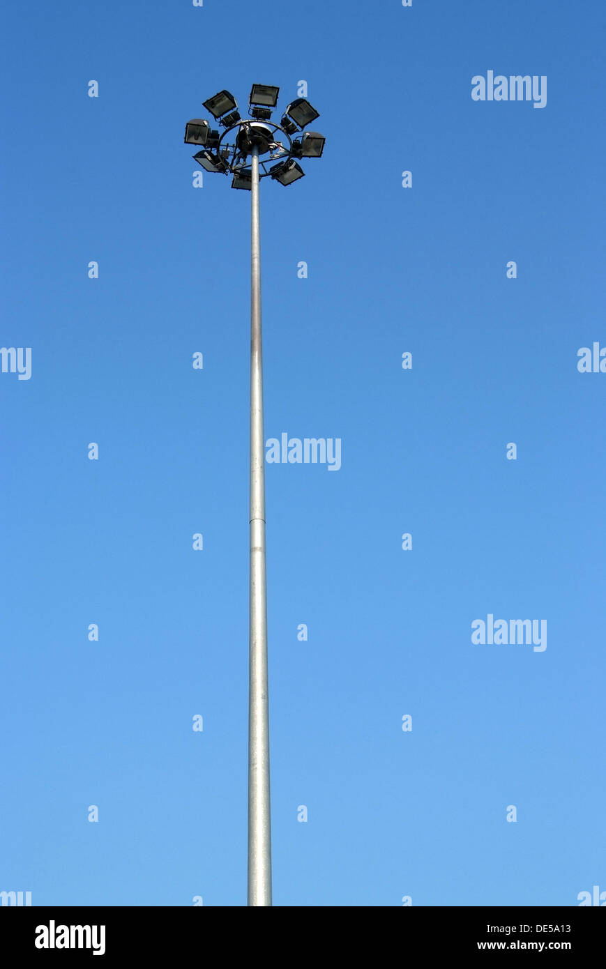 The street lamp tower on blue sky background Stock Photo - Alamy
