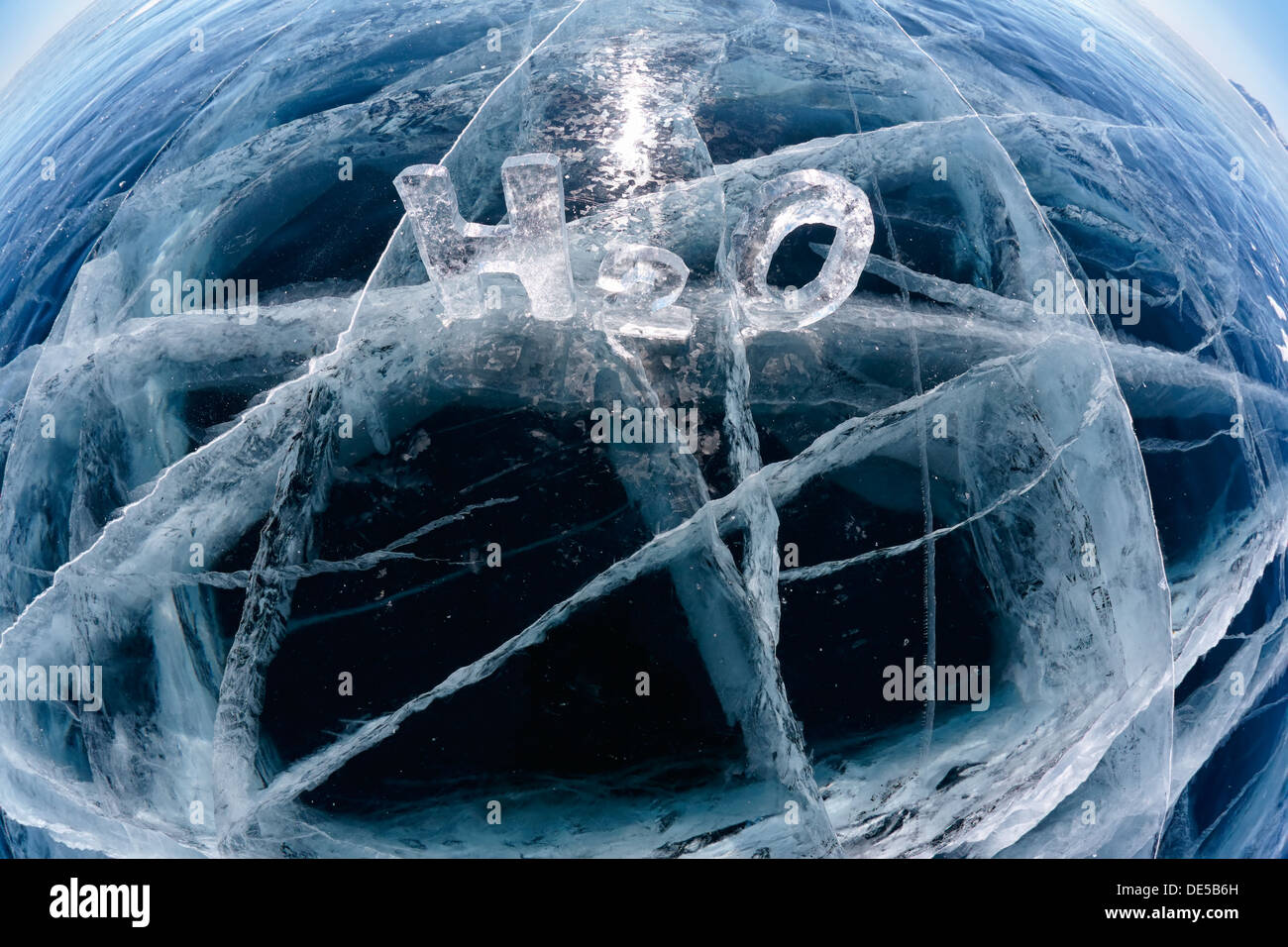 Chemical formula of water H2O made from ice on winter frozen lake ...