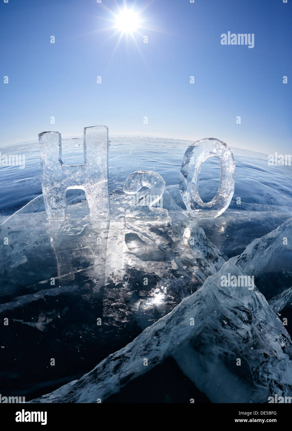 Chemical formula of water H2O made from ice on winter frozen lake ...